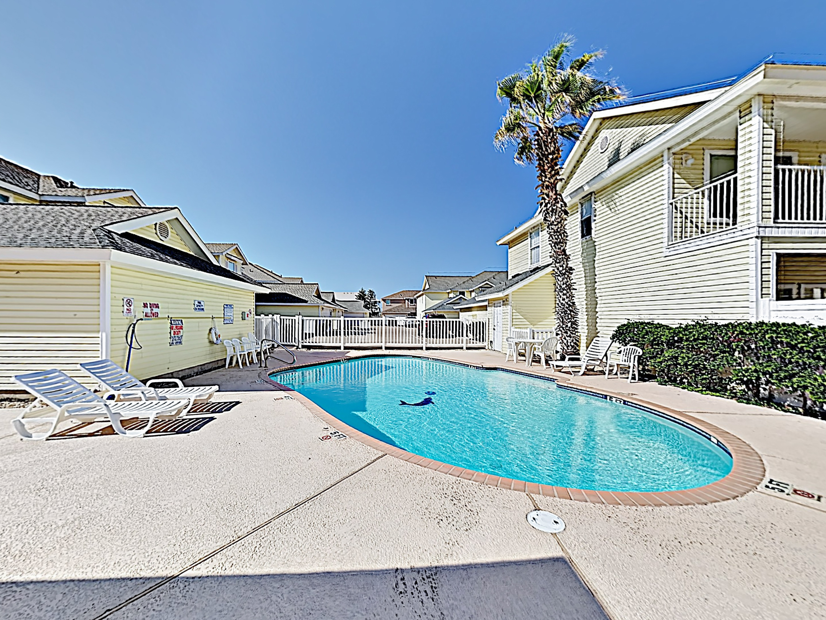 Photo of Recently Renovated Townhouse With Pool Walk To Beach